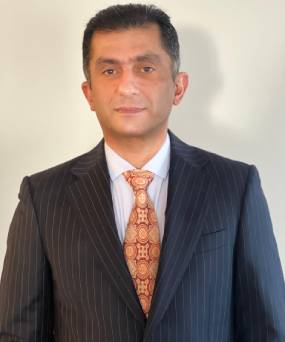 Dr. Colby Oitment - Afiya Spine and Pain Institute